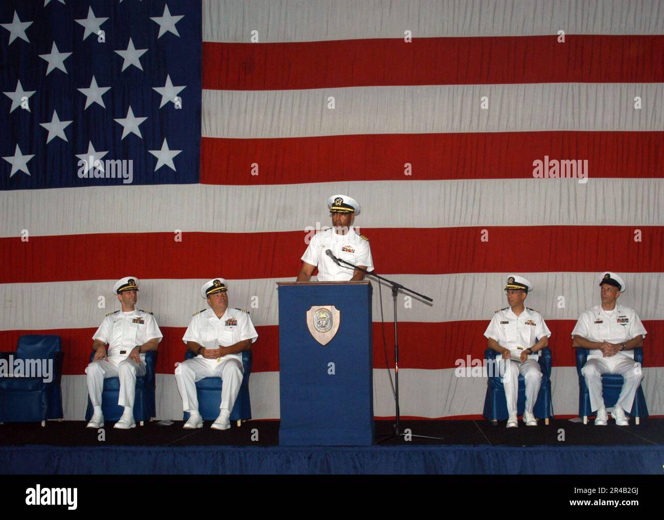 US Navy Commander, Amphibious Squadron Eight, Capt. addresses the crew ...