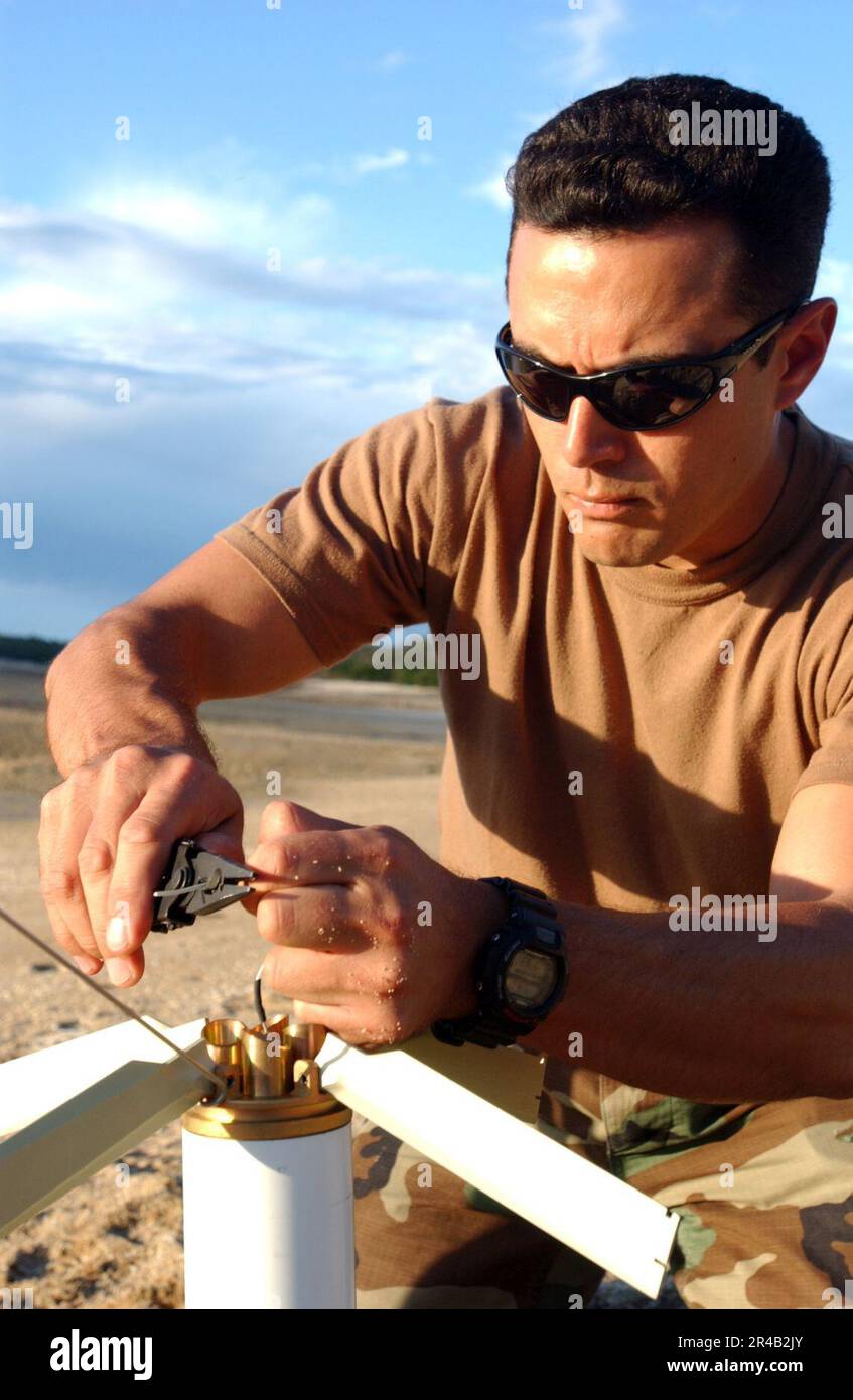 US Navy Officer in Charge Explosive Ordnance Disposal Mobile Unit Five ...