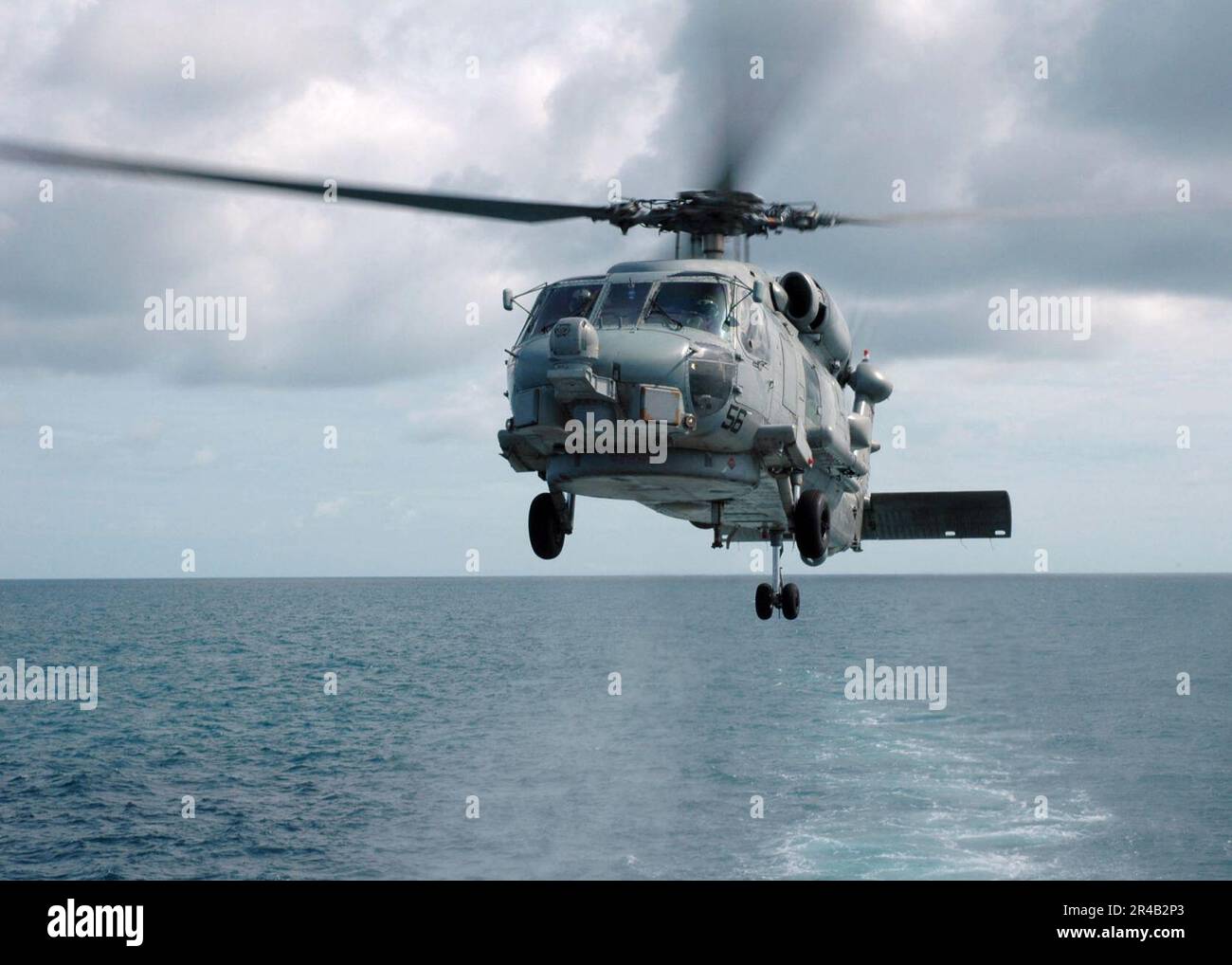 US Navy An SH-60B Seahawk helicopter prepares to land on the flight ...