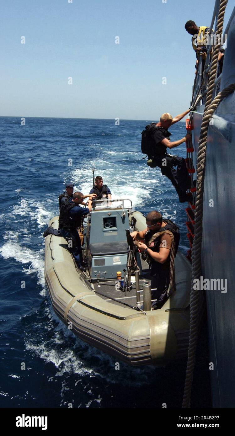 US Navy Sailors assigned the boarding team aboard the guided missile ...