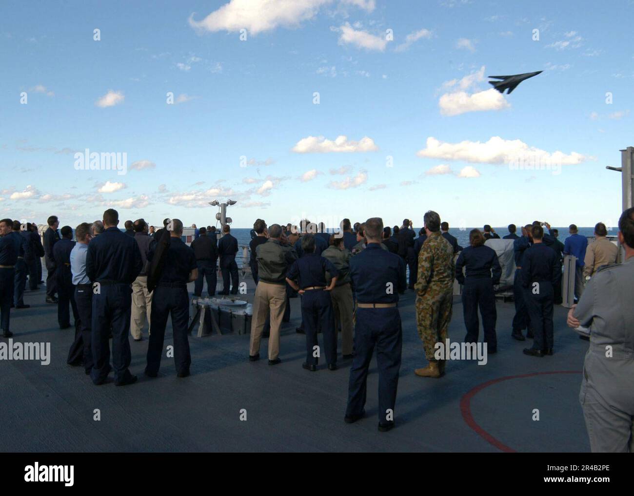 US Navy U.S. Navy and Australian service members watch from the main ...
