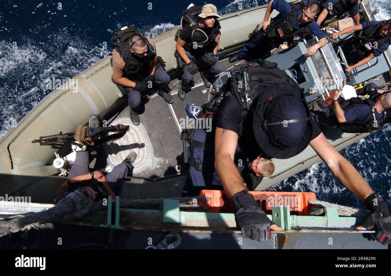 US Navy Sailors assigned the boarding team aboard the guided missile ...