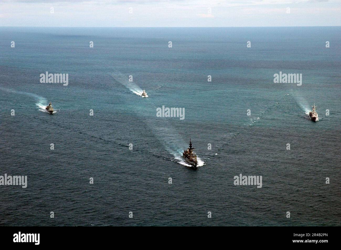 US Navy The guided missile frigate USS Rodney M. Davis (FFG 60), right ...