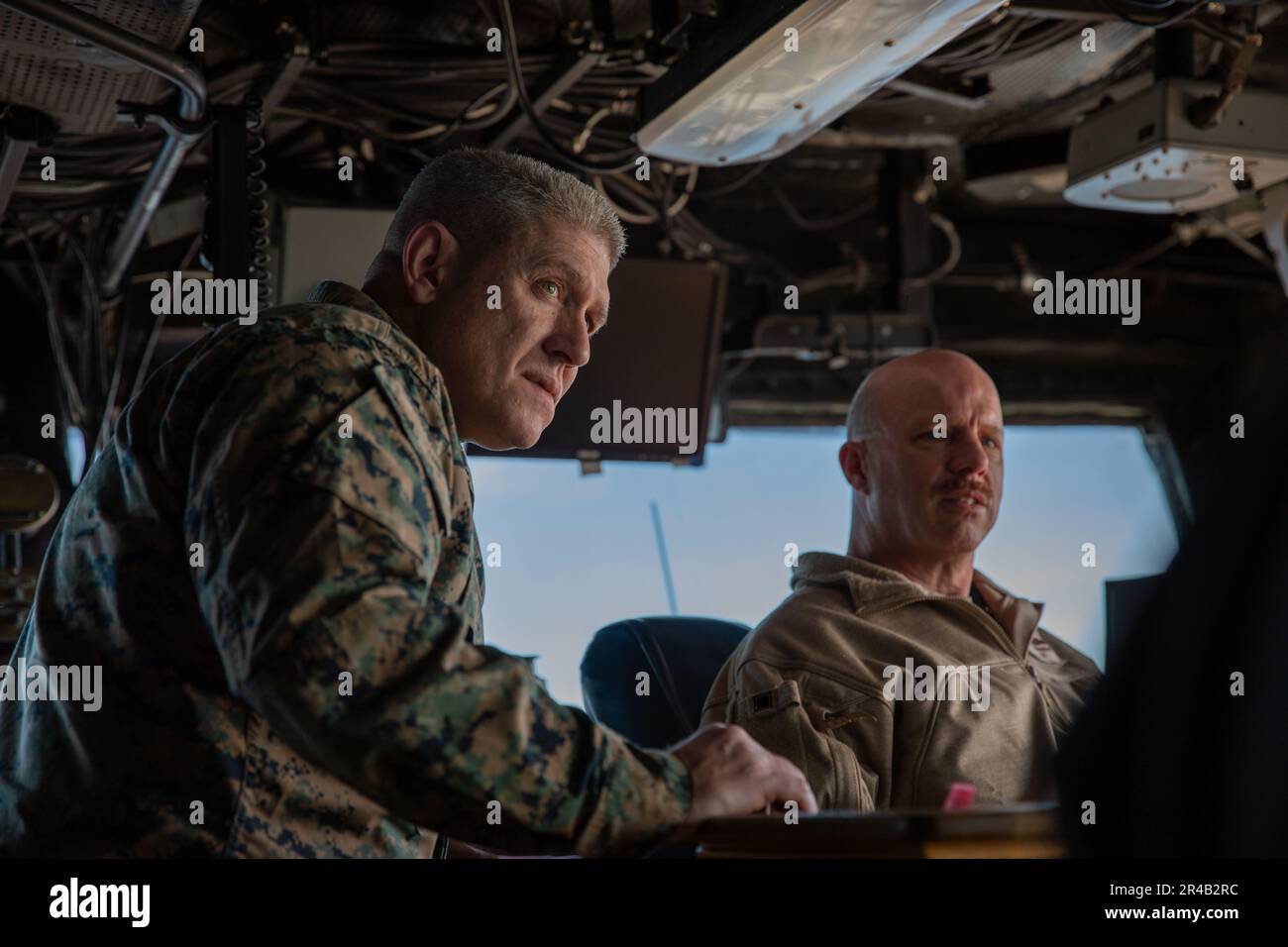 U.S. Marine Corps Col. Dennis Sampson (left), the commanding officer of ...