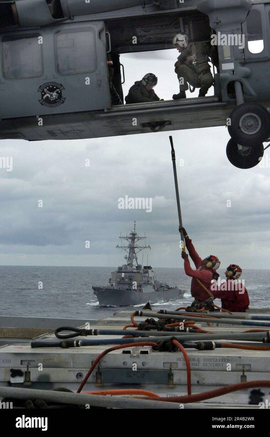 US Navy Weapons department personnel assigned aboard the USS Kitty Hawk ...