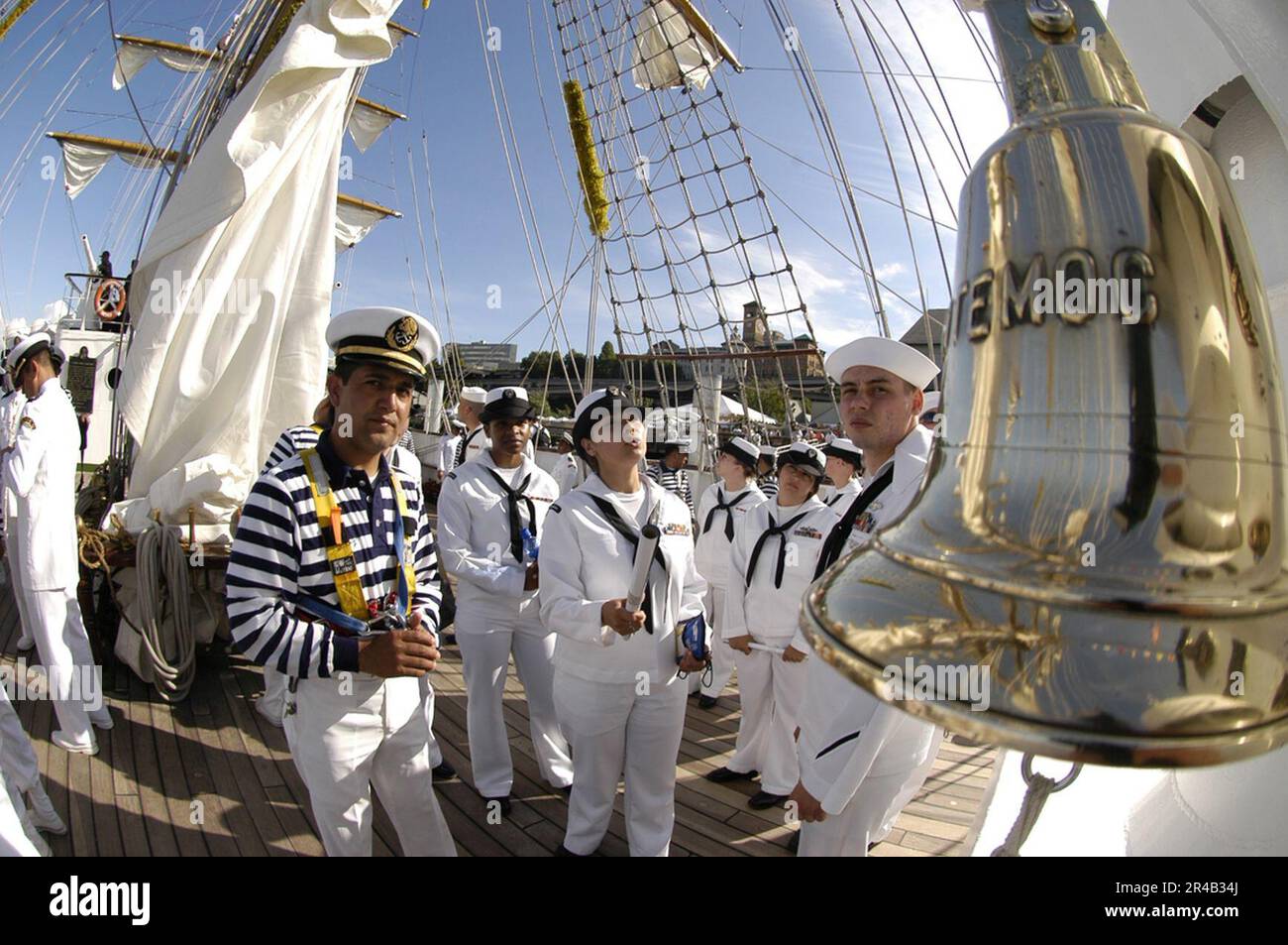 US Navy Quartermaster 2nd Class center, and her Nimitz-class aircraft carrier USS Abraham ...