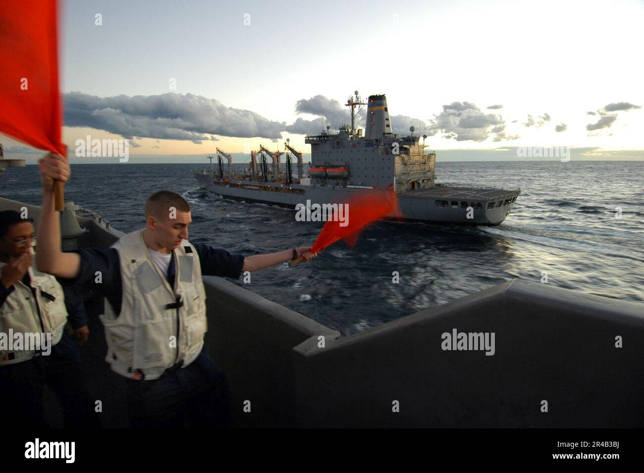 US Navy Seaman flag walks for bridge team stationed aboard the ...