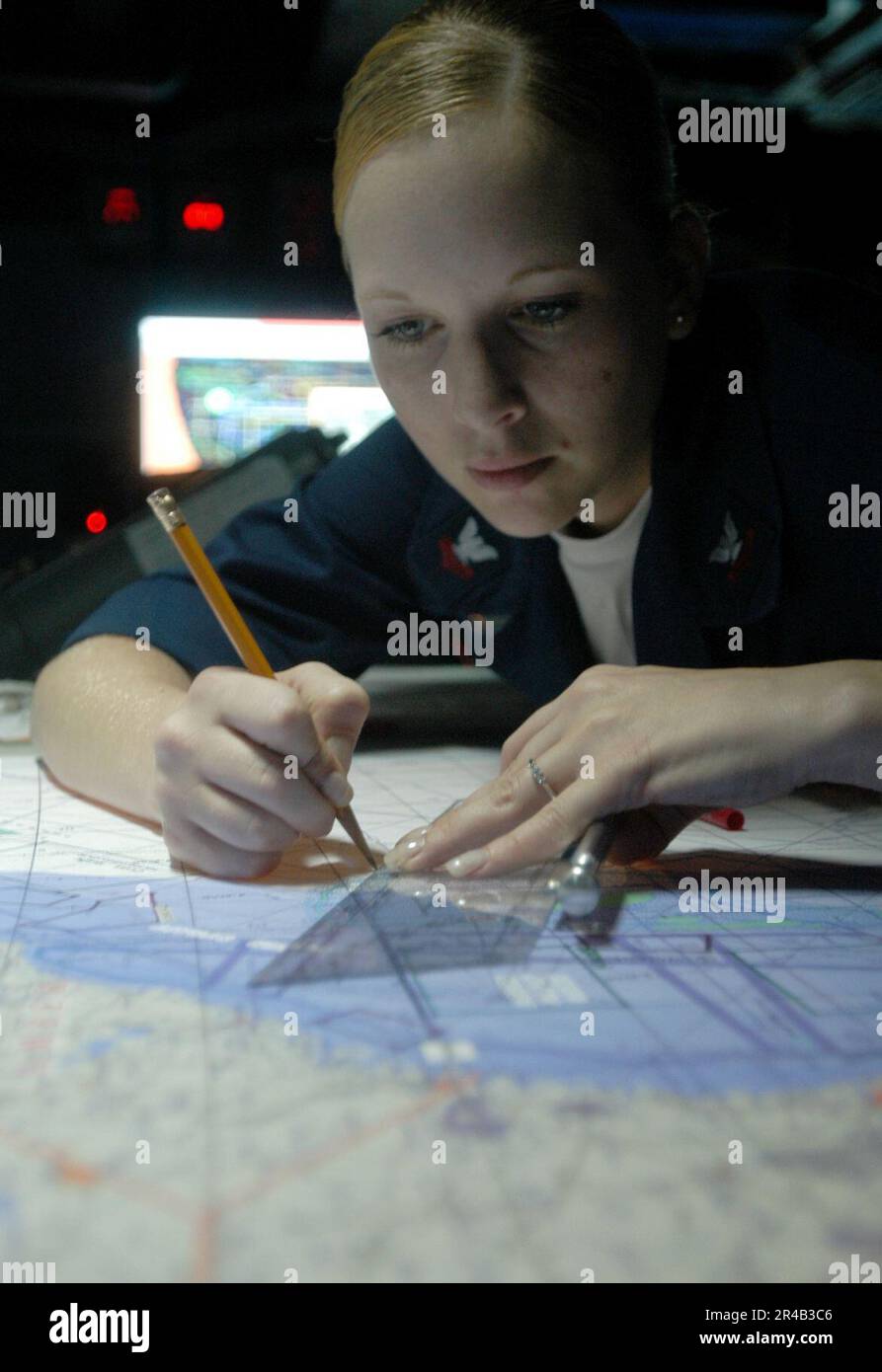 US Navy Operations Specialist 2nd Class tracks the prospective flight ...