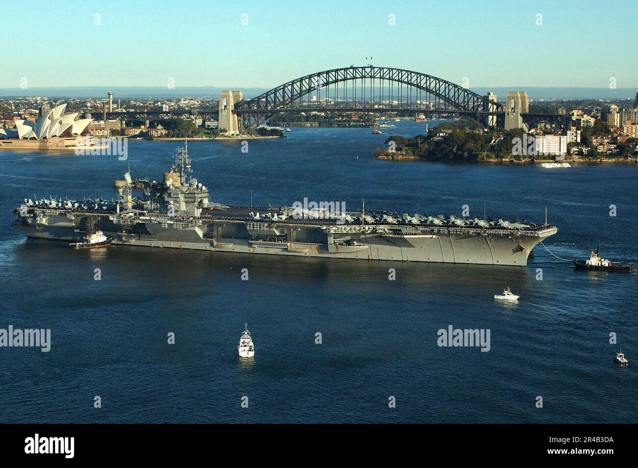 US Navy Sailors man the rails of the conventionally powered aircraft ...