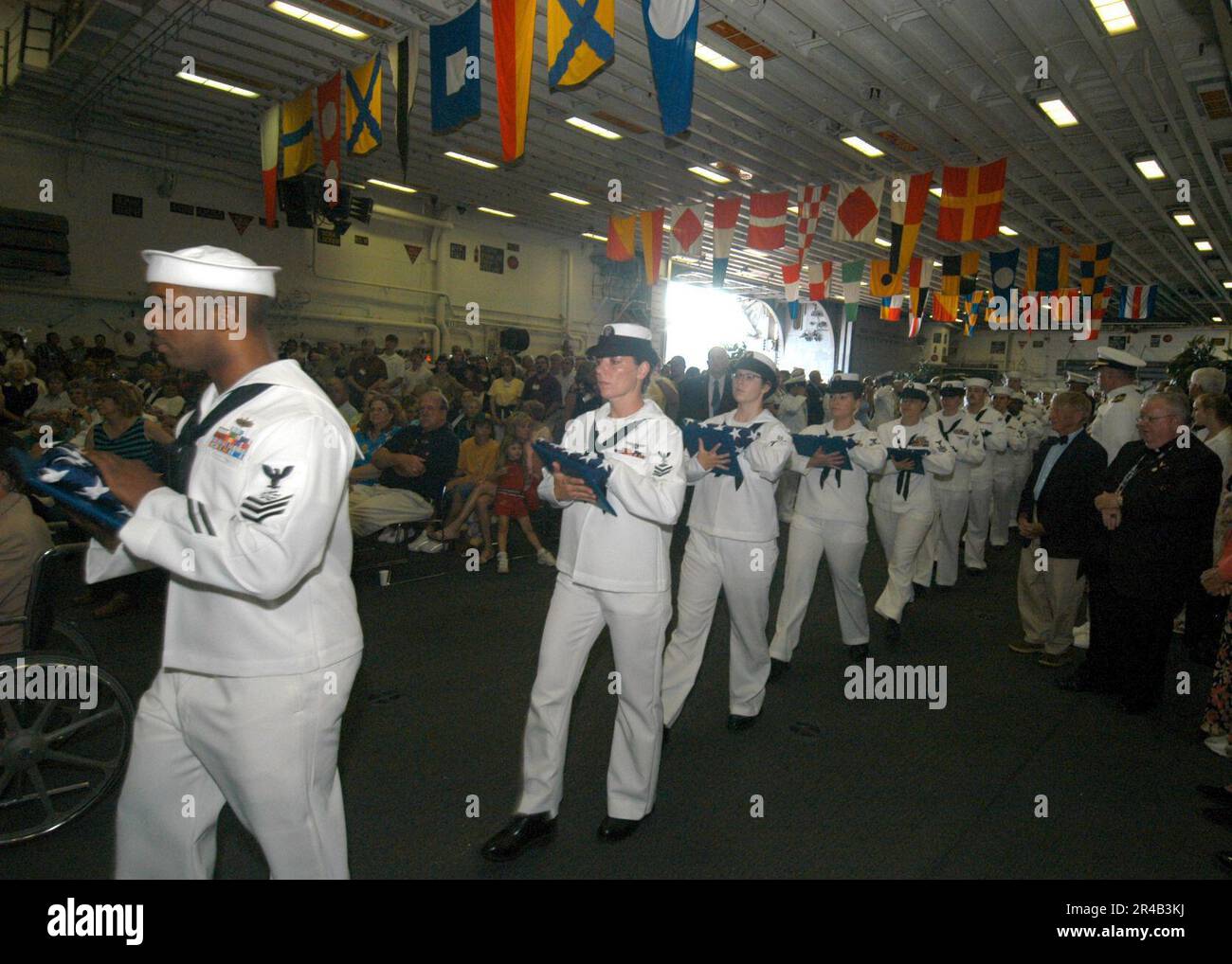 US Navy Several Sailors serve as flag bearers marching through the ...