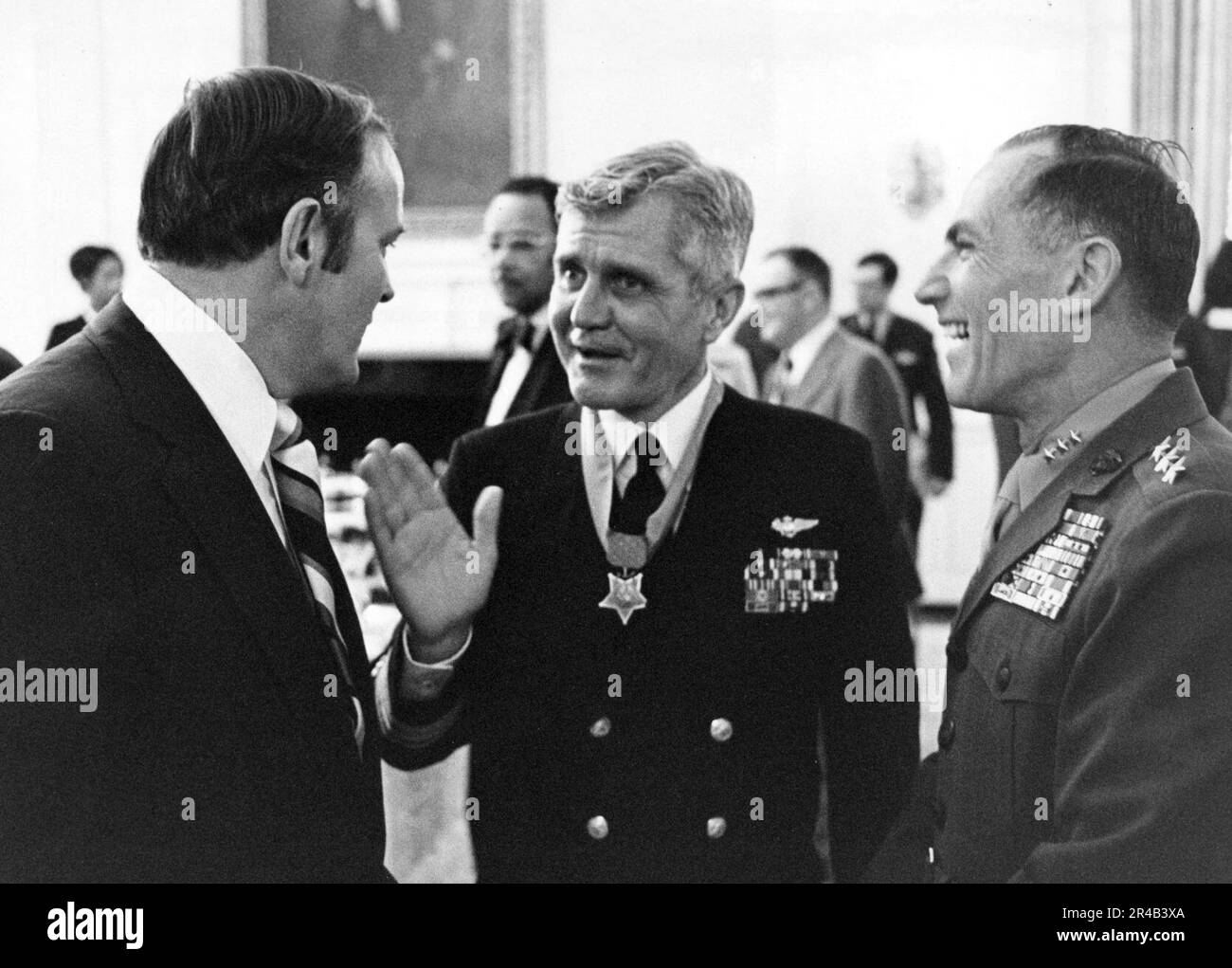 US Navy Medal of Honor recipient Rear Adm. James B. Stockdale, center ...