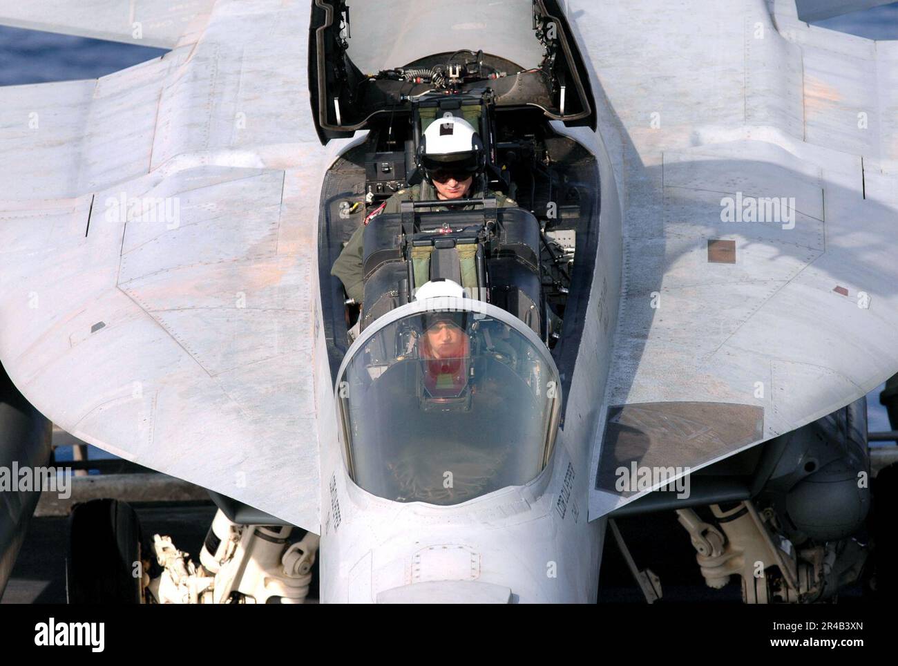 US Navy A pilot and Weapons Systems Operator wait for the call to start ...
