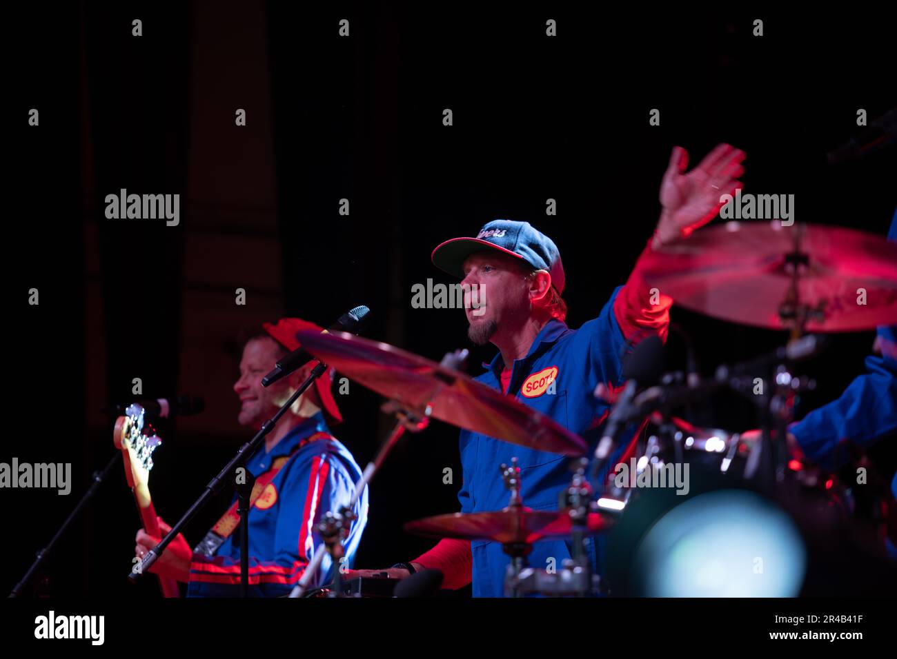 Imagination Mover Scott Durbin encourages the crowd to follow along in ...