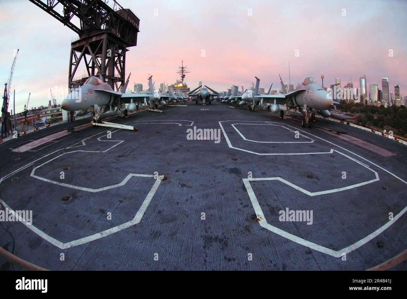 US Navy Aircraft sit on the flight deck aboard the conventionally ...