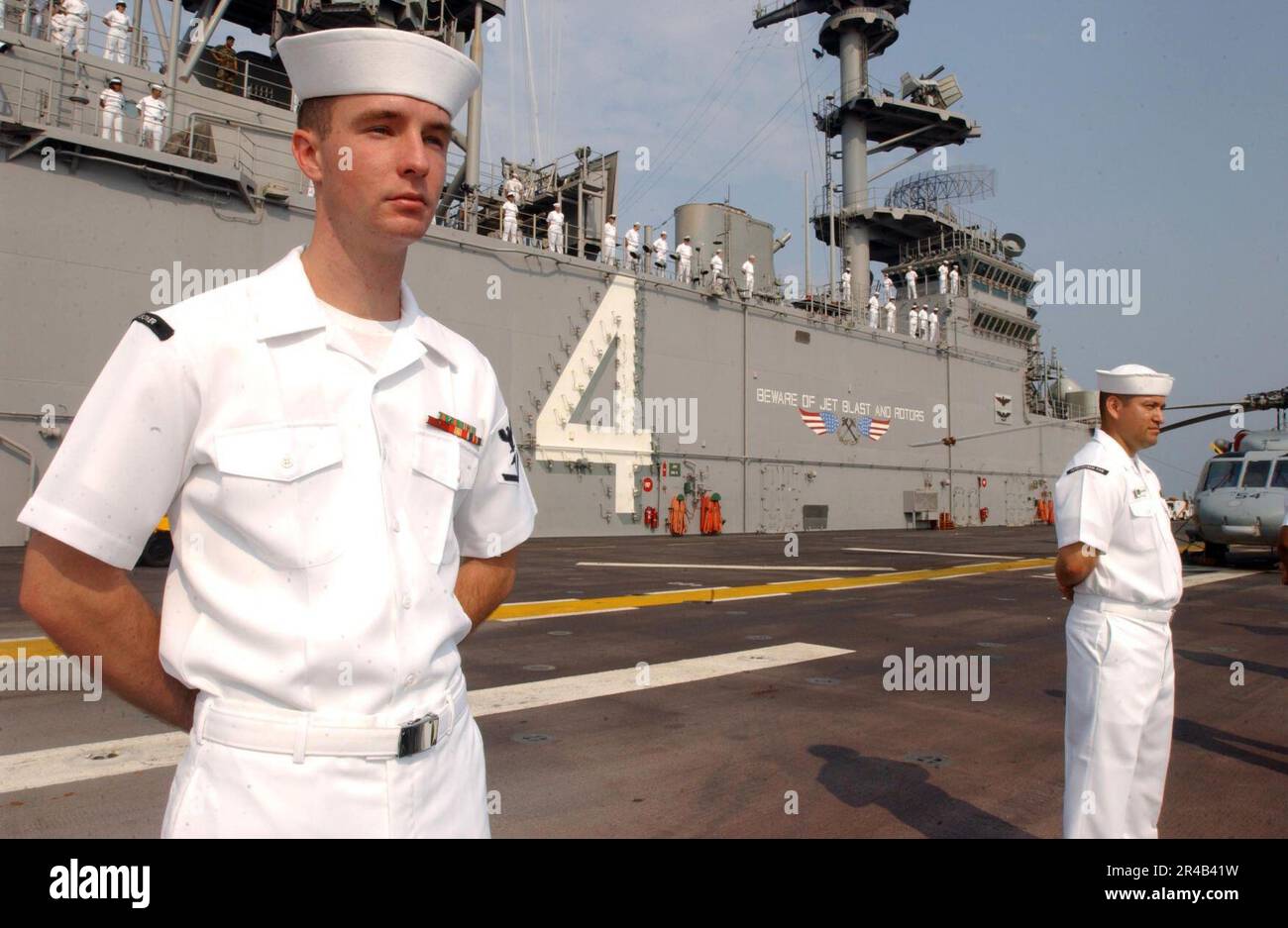 US Navy Hospital Corpsman 3rd Class mans the rails as the amphibious ...