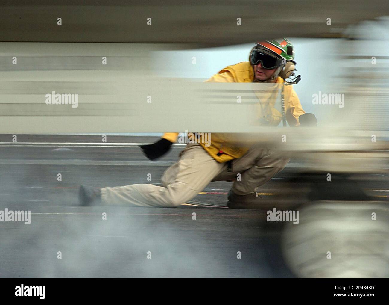 US Navy A catapult shooter signals the launch of an E-2C Hawkeye Stock ...