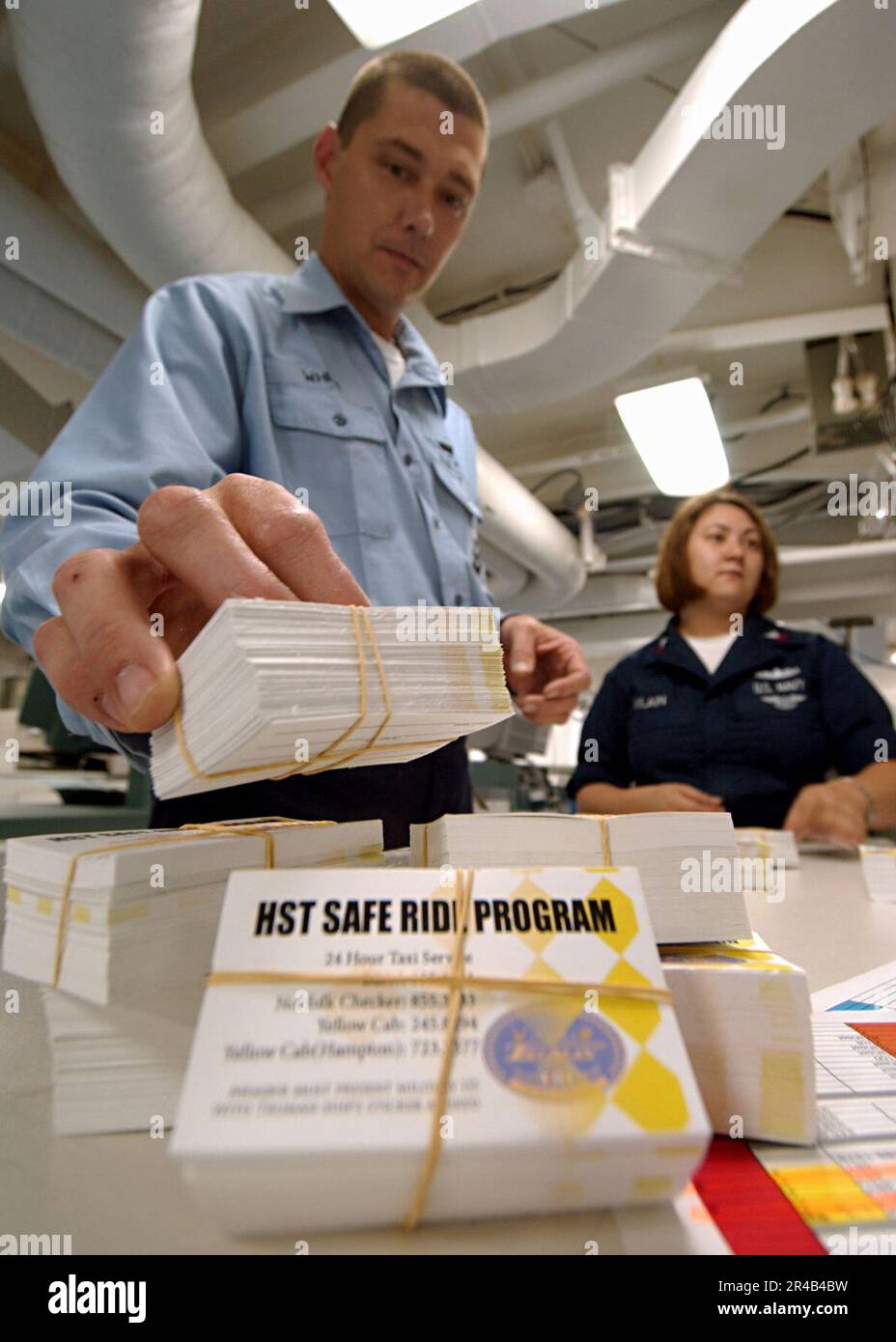 US Navy Lithographer's Mate 1st Class left, and Journalist 1st Class ...