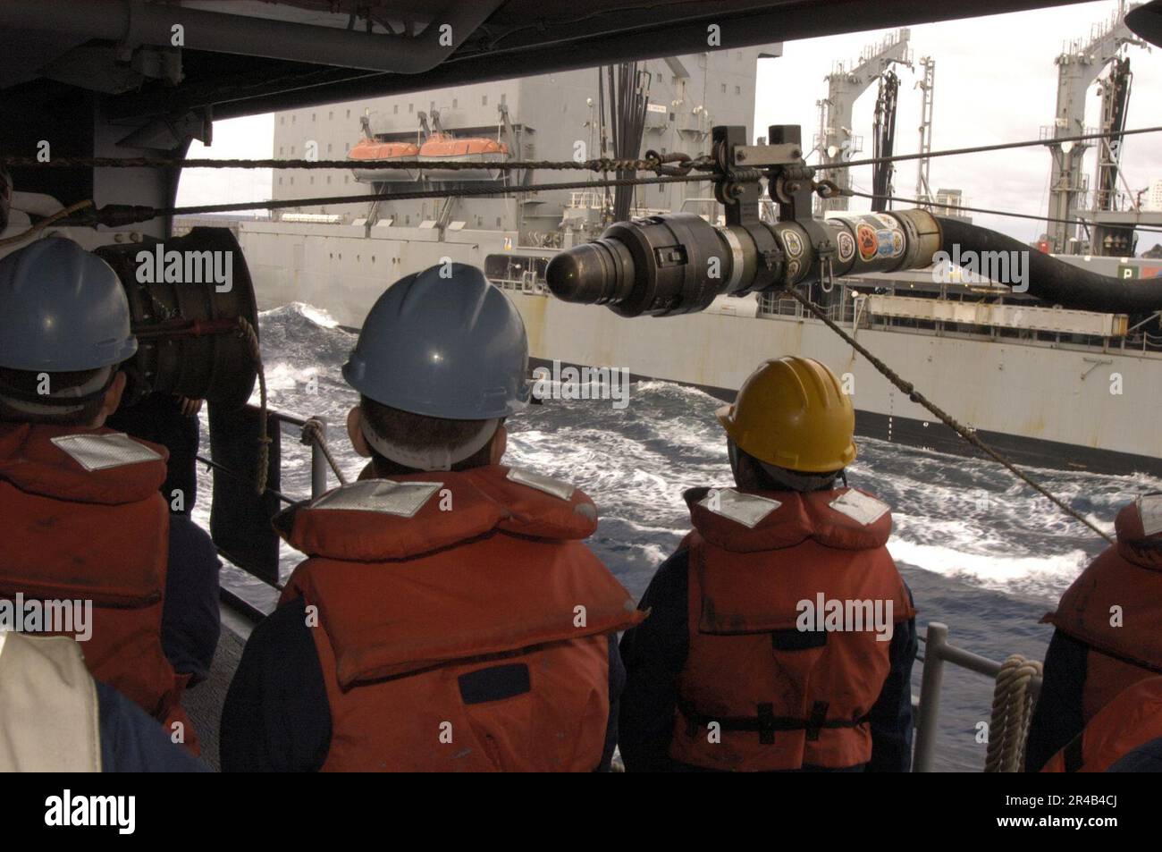 US Navy Personnel aboard the Seventh Fleet command ship USS Blue Ridge ...