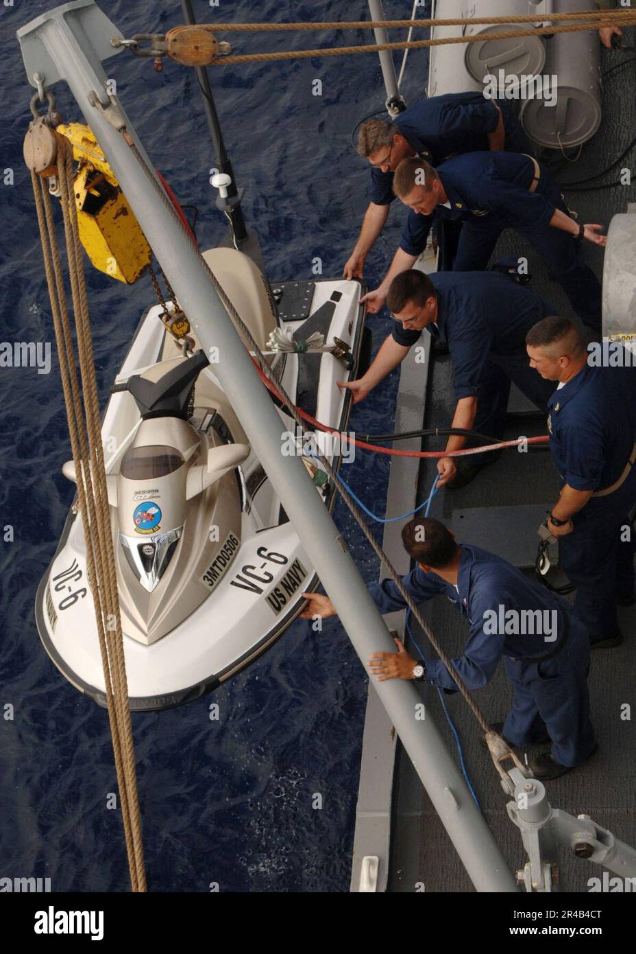US Navy Sailors assigned to Fleet Composite Squadron Six (VC-6), hoist ...