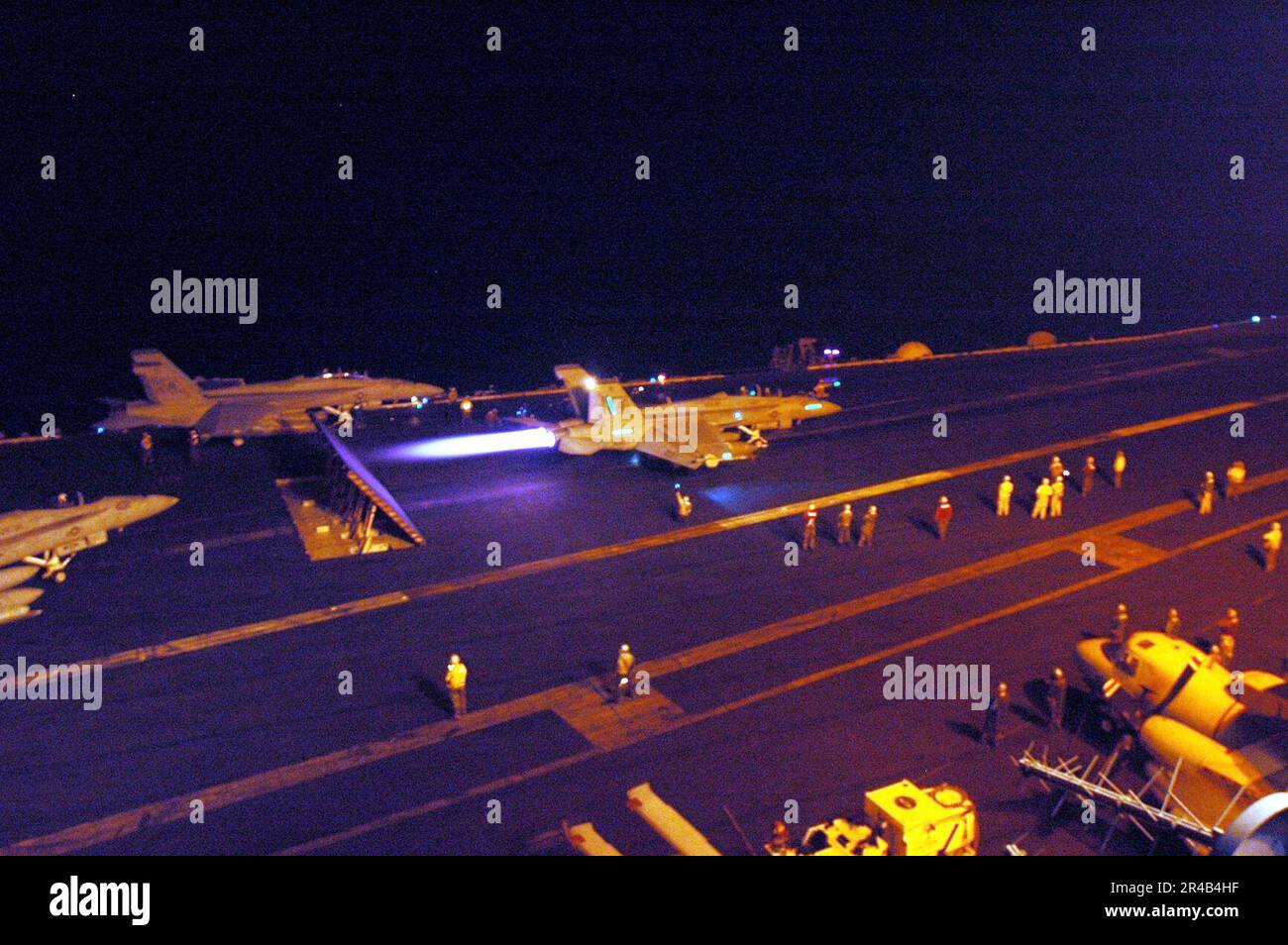 US Navy An F-A-18F Super Hornet oes to full afterburner prior to ...