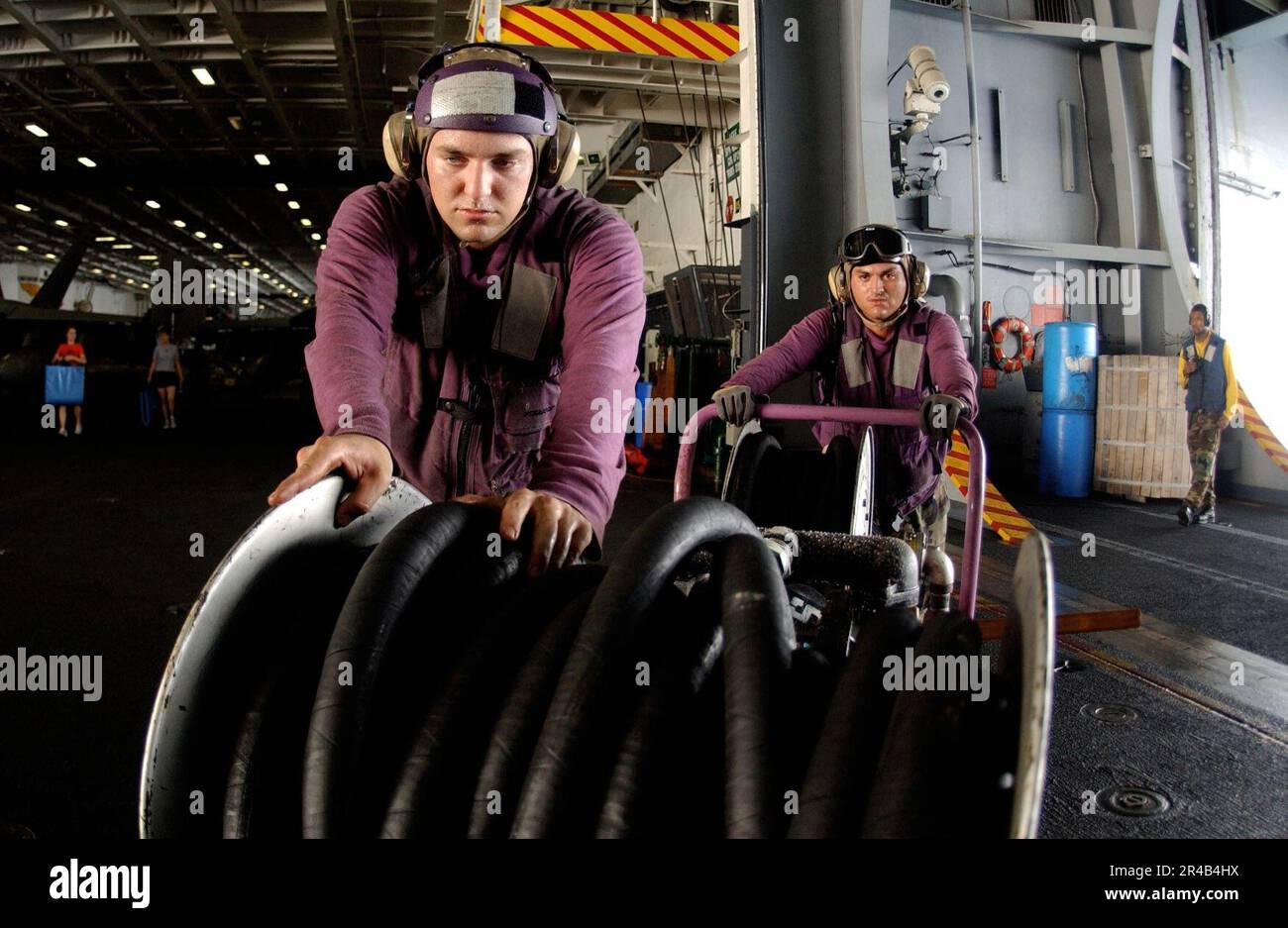 US Navy ion Boatswain's Mate 3rd Class prepare to swap-out a de-fuel ...