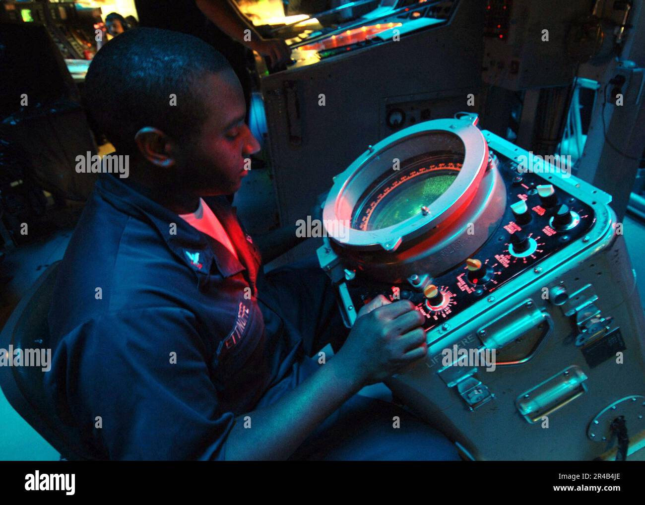 US Navy Operations Specialist 2nd Class assigned to the guided missile ...