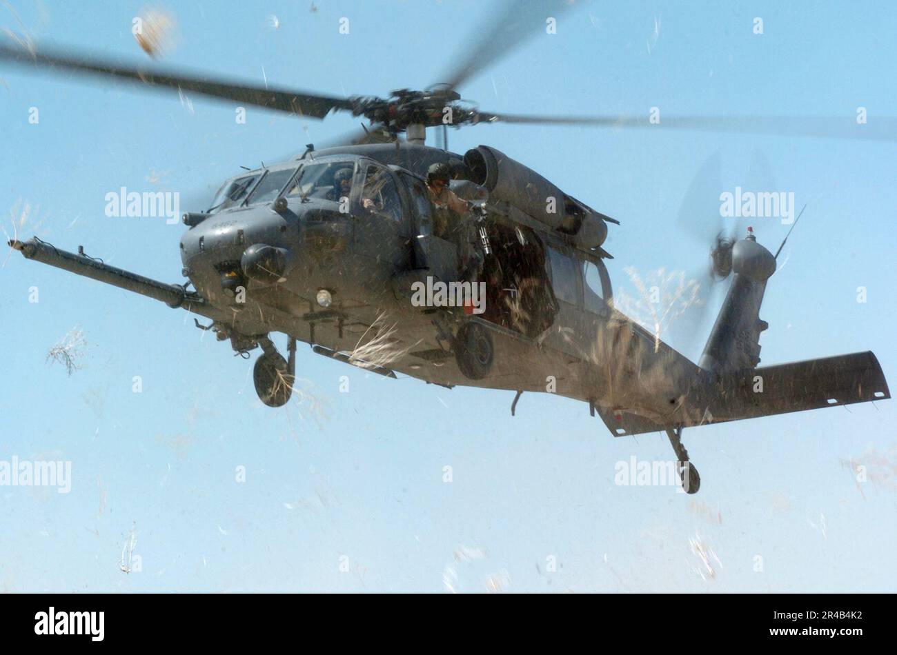 US Navy A U.S. Air Force HH-60 Pacehawk helicopter lands near Naval Air ...