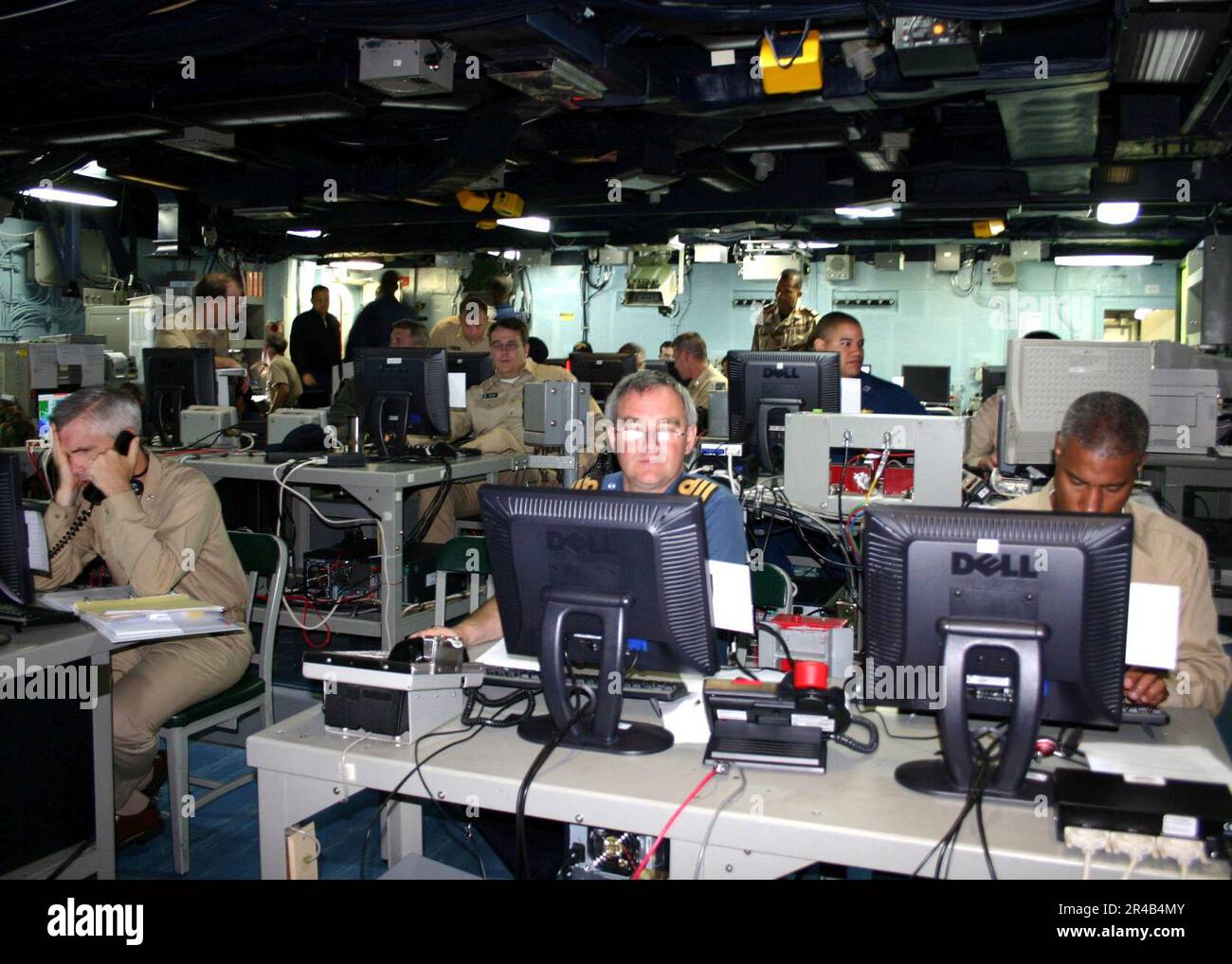 US Navy U.S. and Coalition joint forces man the Joint Operations Center ...