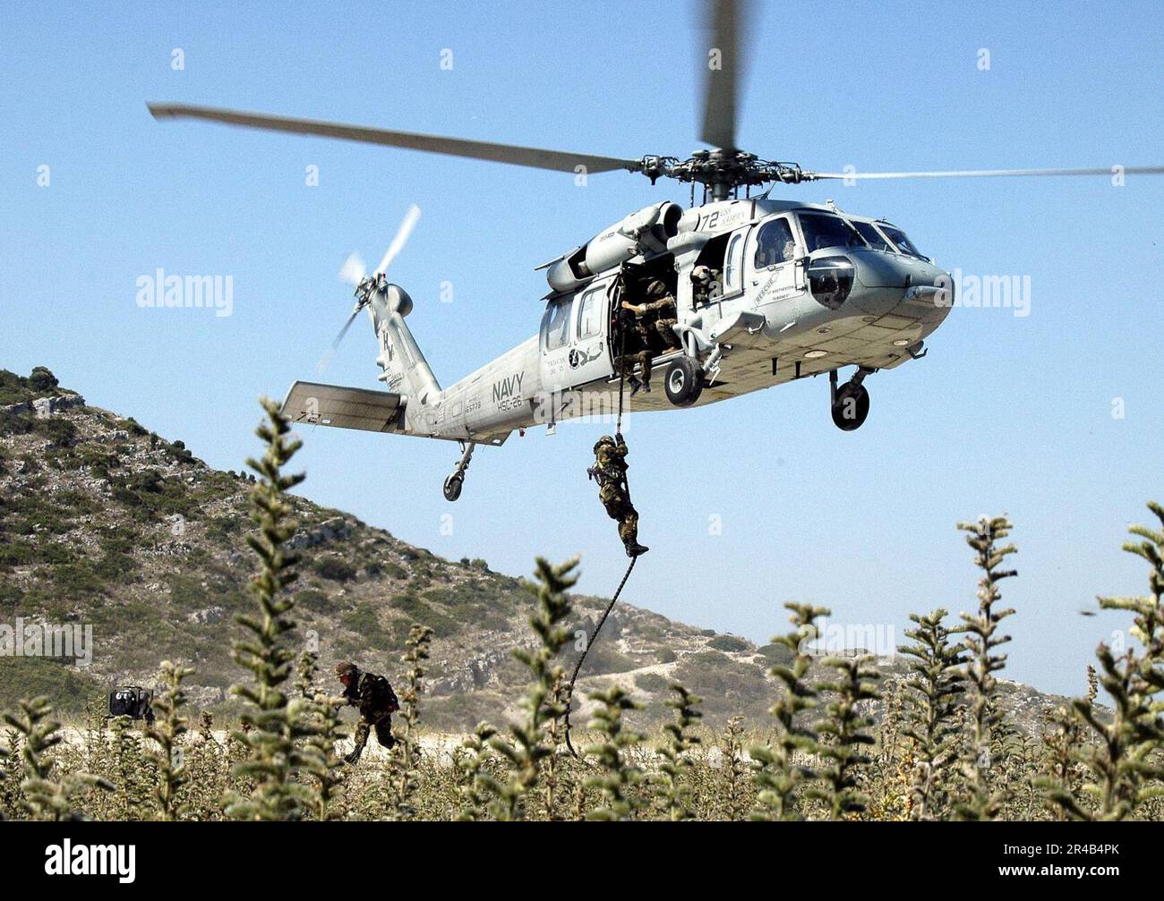 US Navy Albanian Special Forces fast rope from a U.S. Navy MH-60S ...