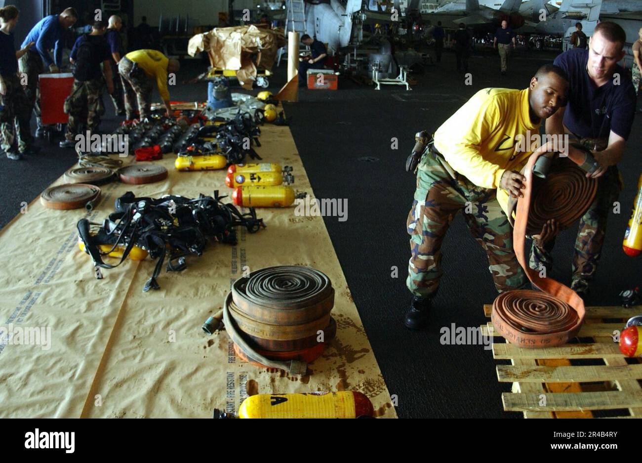 US Navy Air Department personnel inventory damage control equipment in ...