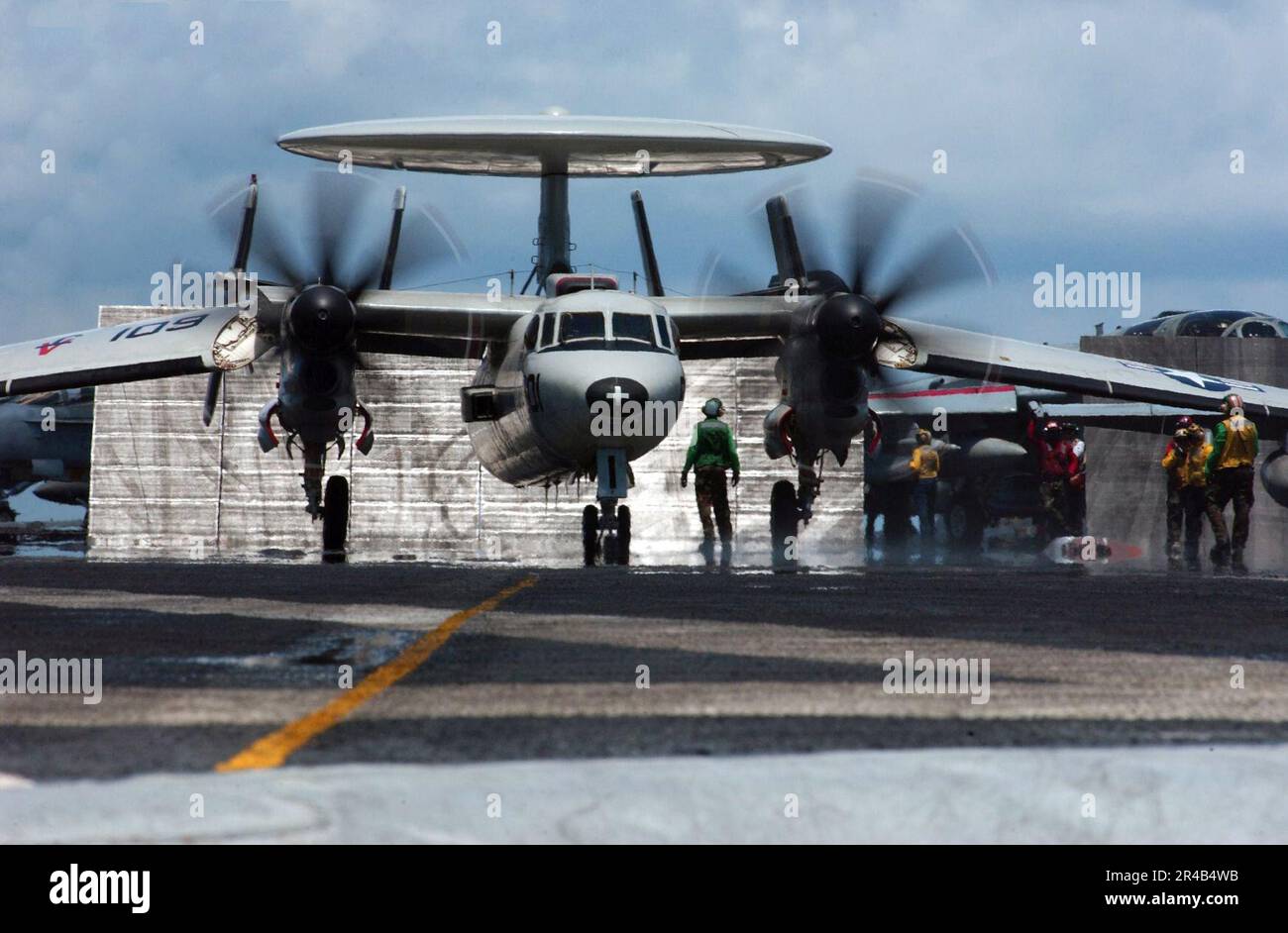 US Navy An E-2C Hawkeye prepares to launch from the flight deck of the ...