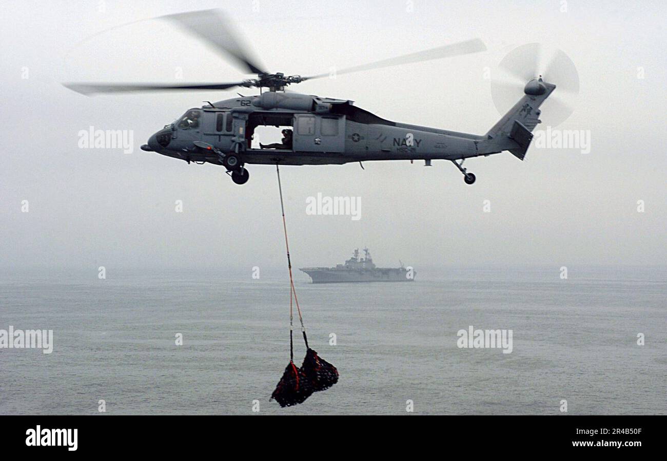 US Navy An MH-60S Seahawk helicopter, assigned to the Blackjacks of the Helicopter Sea Combat ...