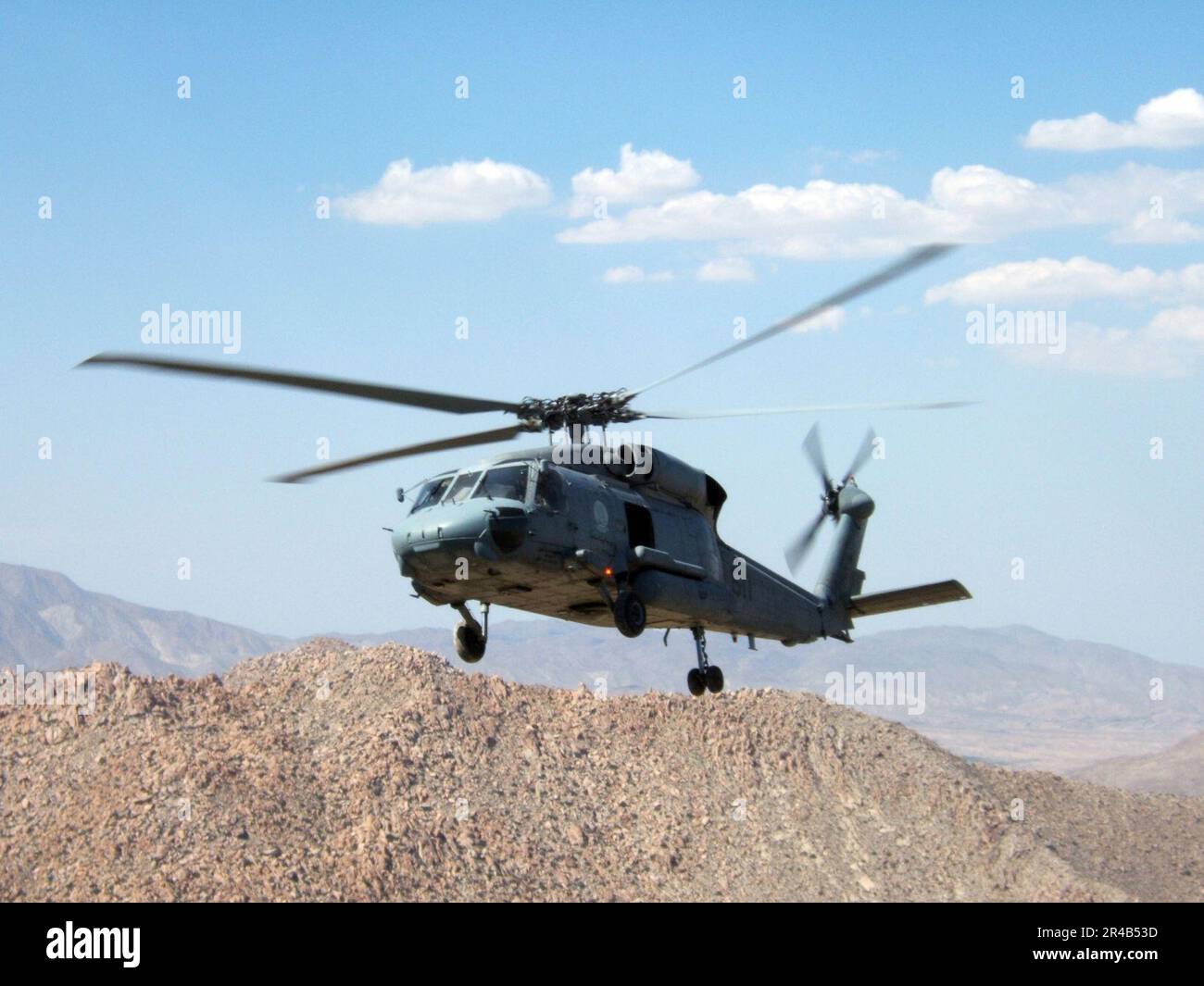 US Navy An SH-60F Seahawk practices conducting two-ship Combat Search ...
