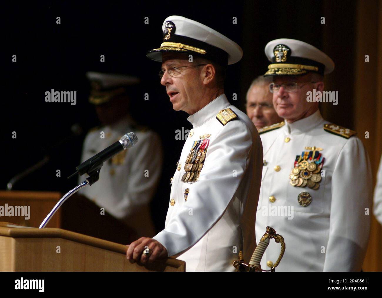 US Navy Adm. Mike Mullen reads his orders during the Chief of Naval ...