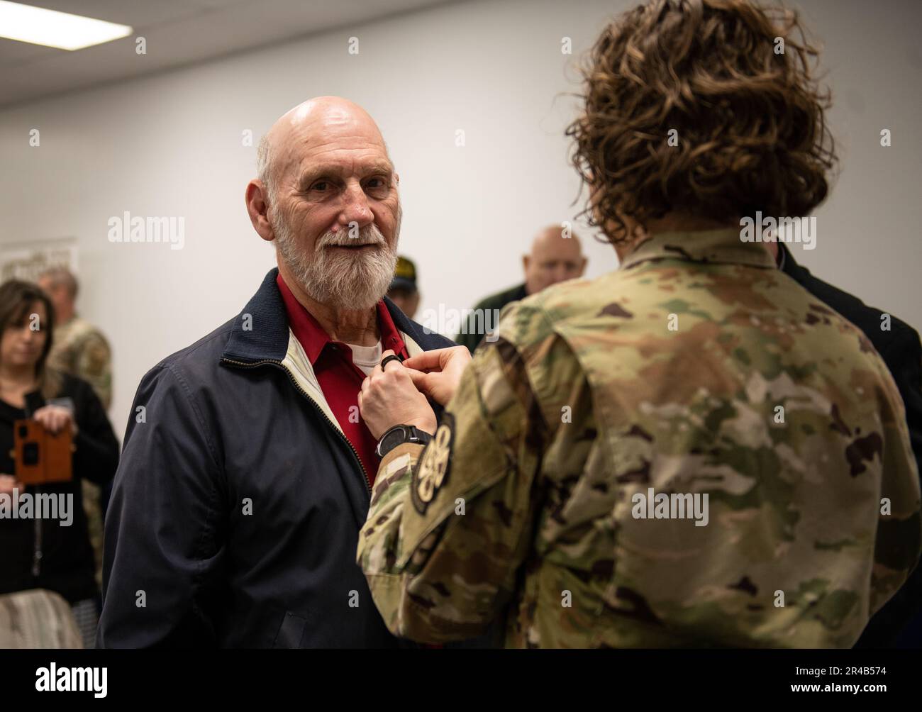 Col. Sirena Morris, 88th Mission Support Group commander, places a pin ...