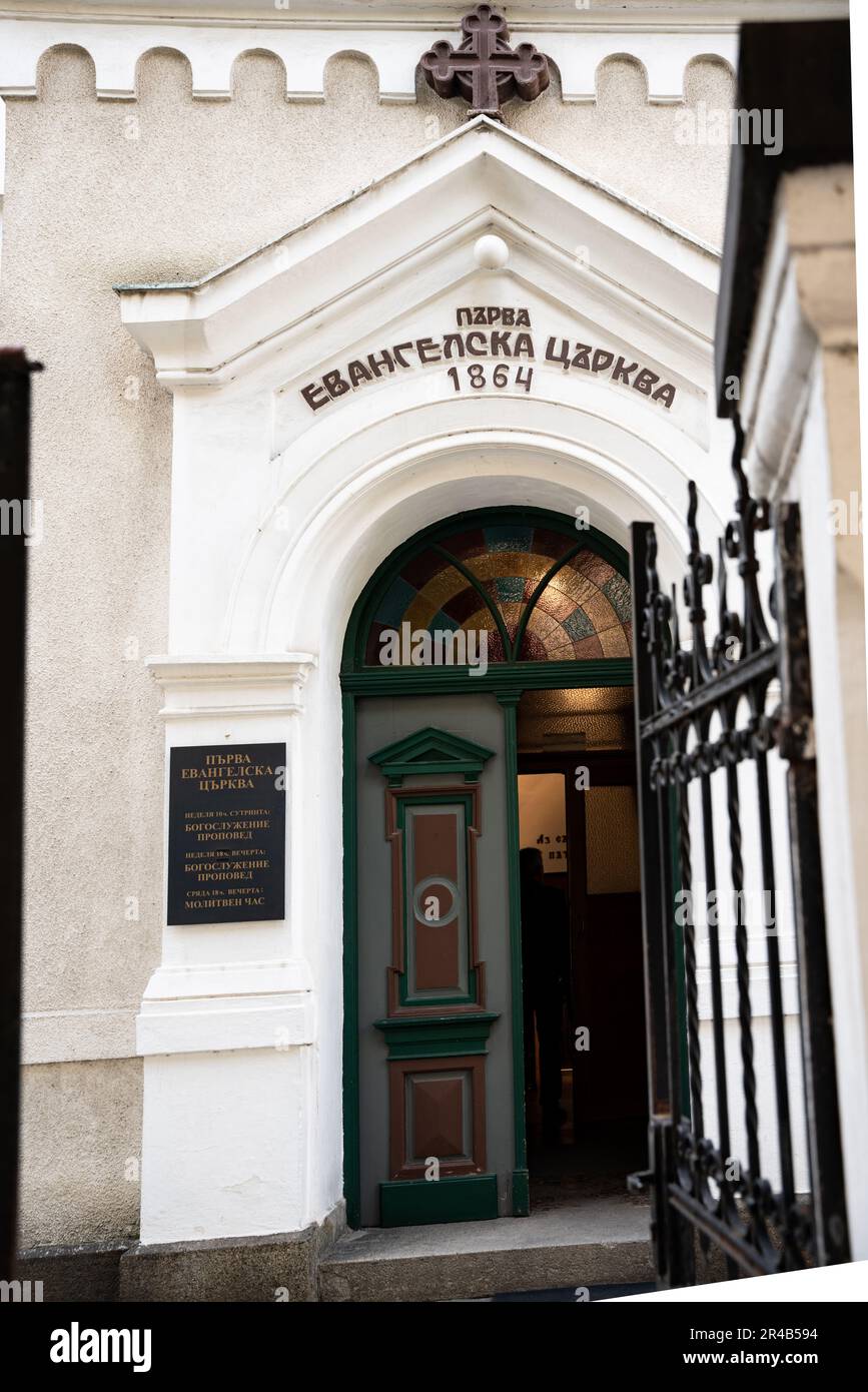A grand entrance of an elegant building is depicted, showcasing a ...