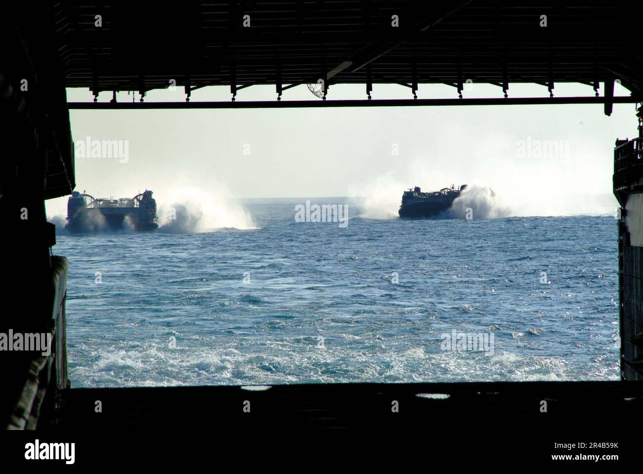 US Navy A pair of Landing Craft, Air Cushions (LCAC) make their way to ...