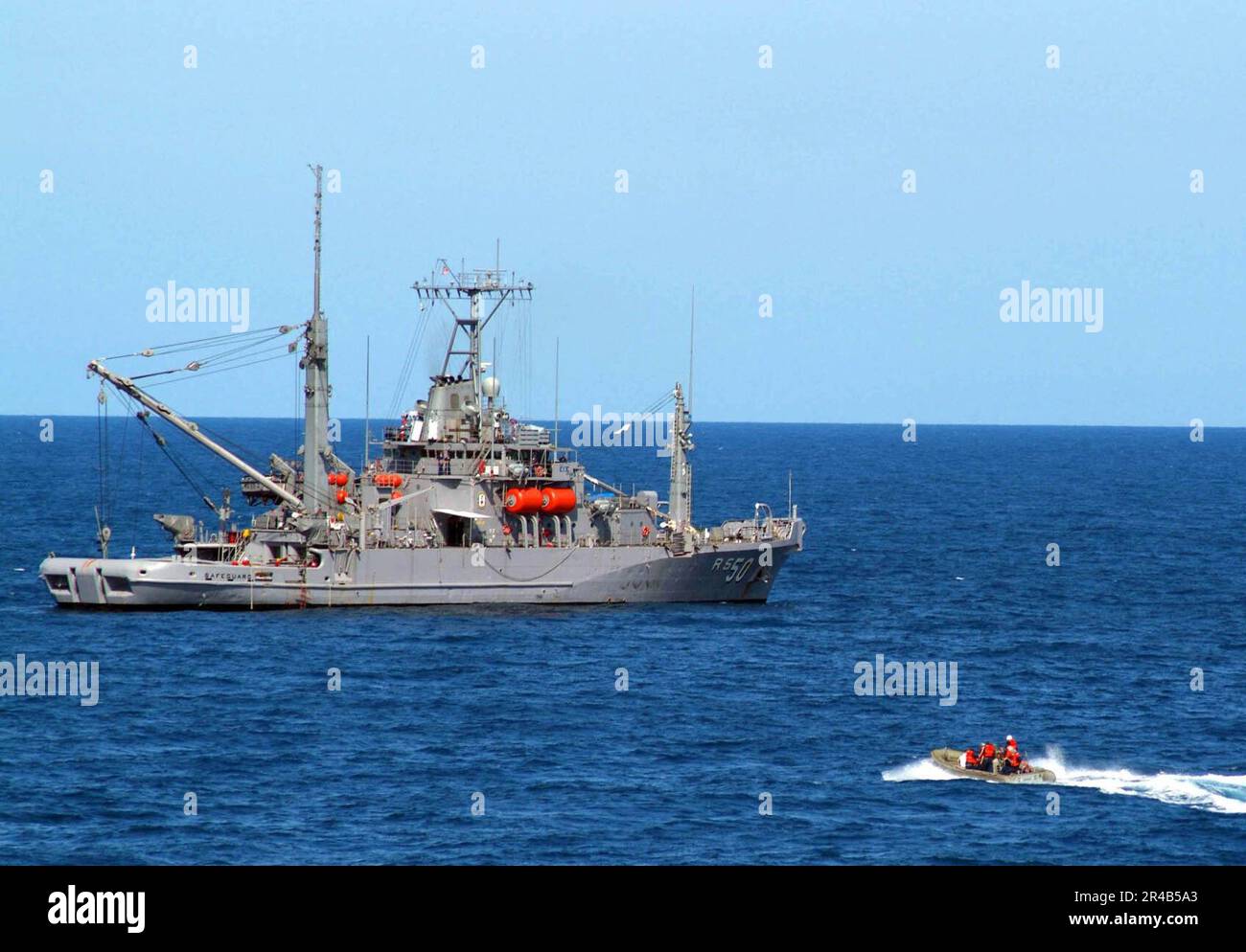 US Navy A rigid hull inflatable boat approaches the rescue and salvage ...