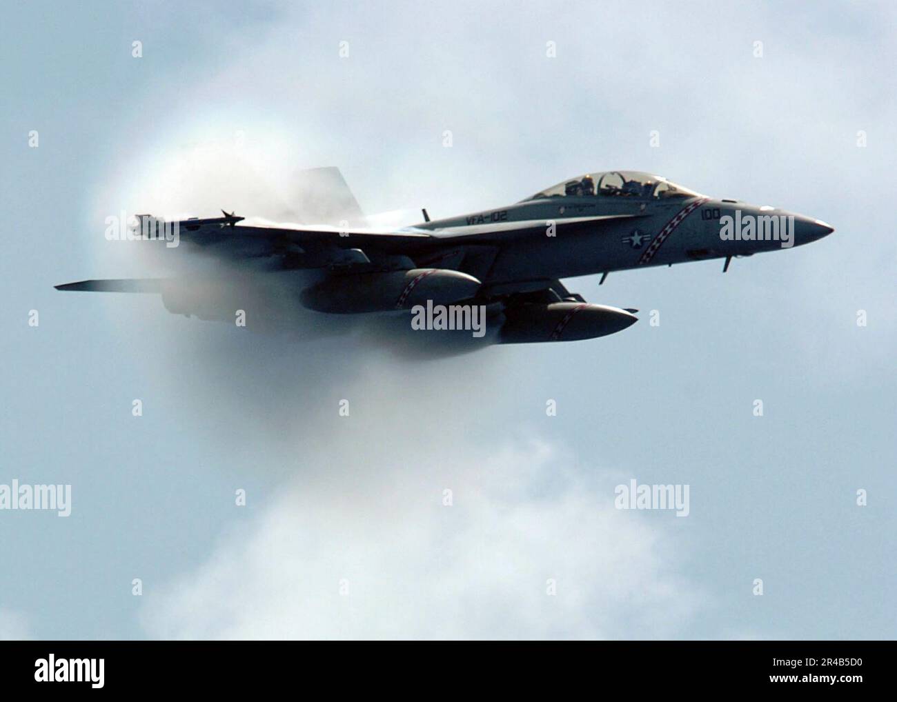 US Navy An F-A-18F Super Hornet breaks the sound barrier during a fly ...