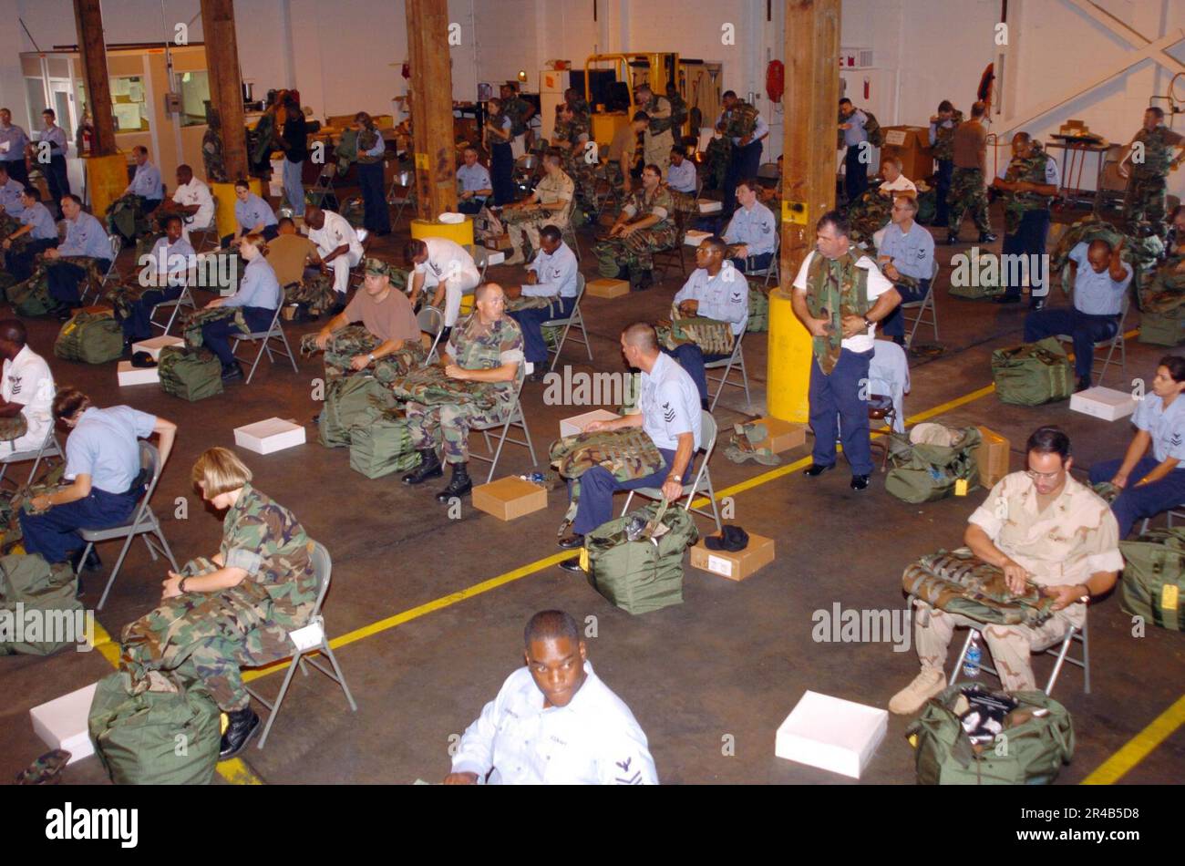 US Navy Sailors assigned to Naval Expeditionary Logistics Support Force ...