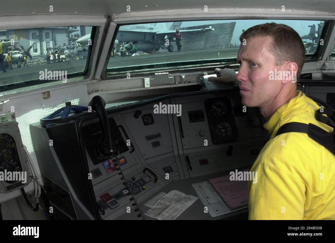 US Navy Lt. mans the Integrated Catapult Control System (ICCS) in the ...