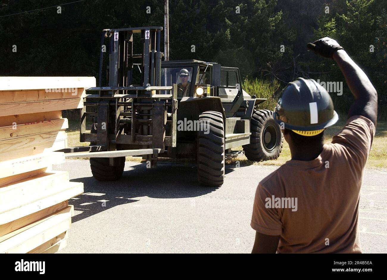 US Navy A Seabee assigned to Amphibious Construction Battalion One (ACB ...