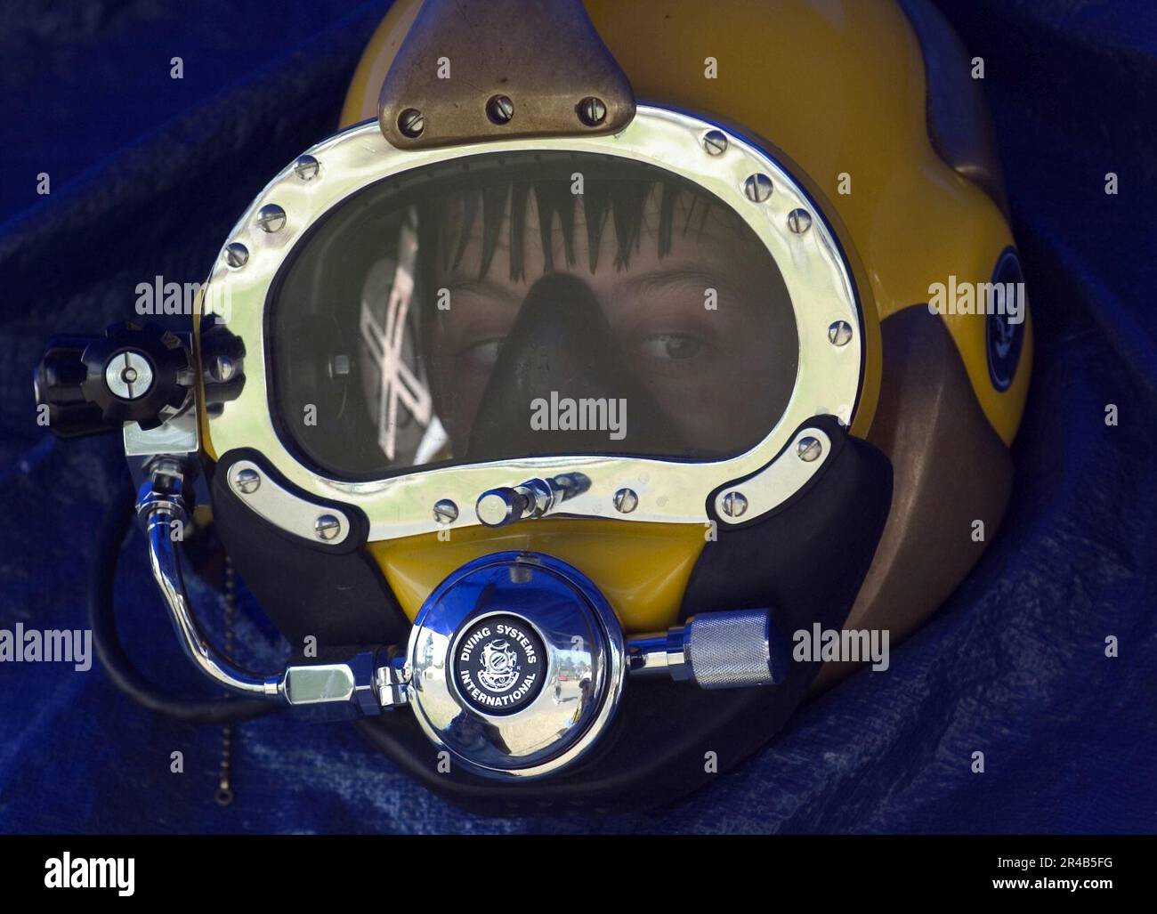 US Navy A Boy Scout looks through a U.S. Navy MK-21 diving helmet at an ...