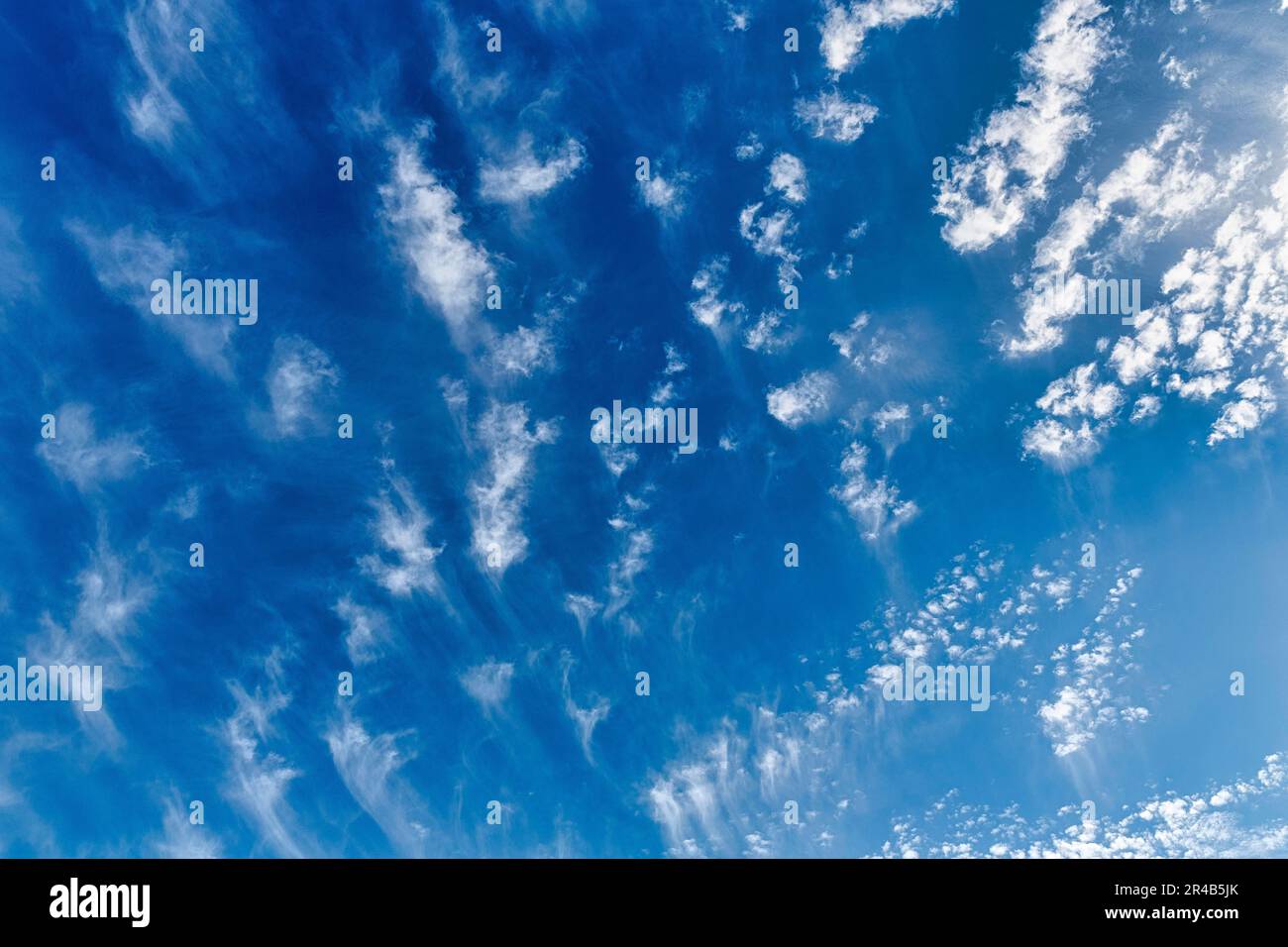 Feather clouds and cirrocumulus in blue sky, full-frame, England, Great Britain Stock Photo - Alamy
