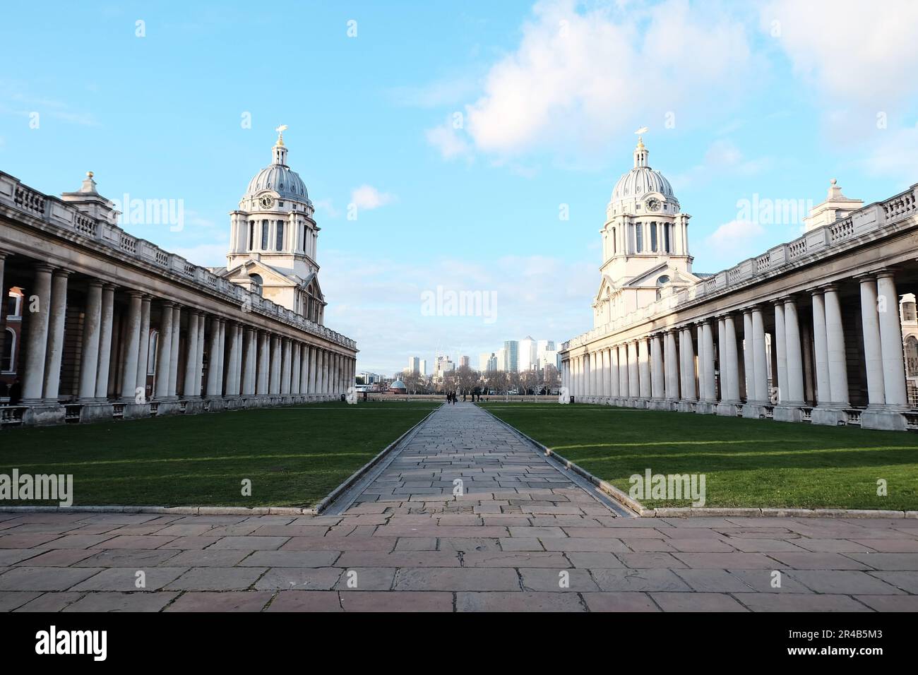 A scenic aerial view of a grand paved pathway leading up to a majestic ...