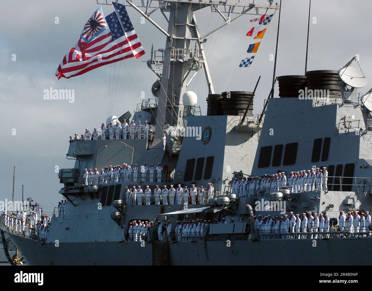 US Navy Sailors man the rails aboard the guided missile destroyer USS O ...