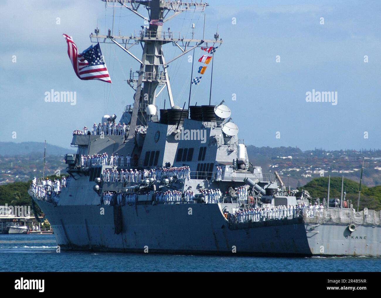 US Navy Sailors man the rails aboard the guided missile destroyer USS O ...