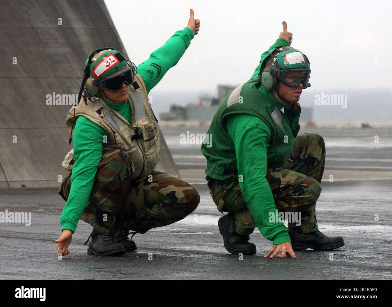 US Navy Final checkers give the clear to launch signal prior to ...