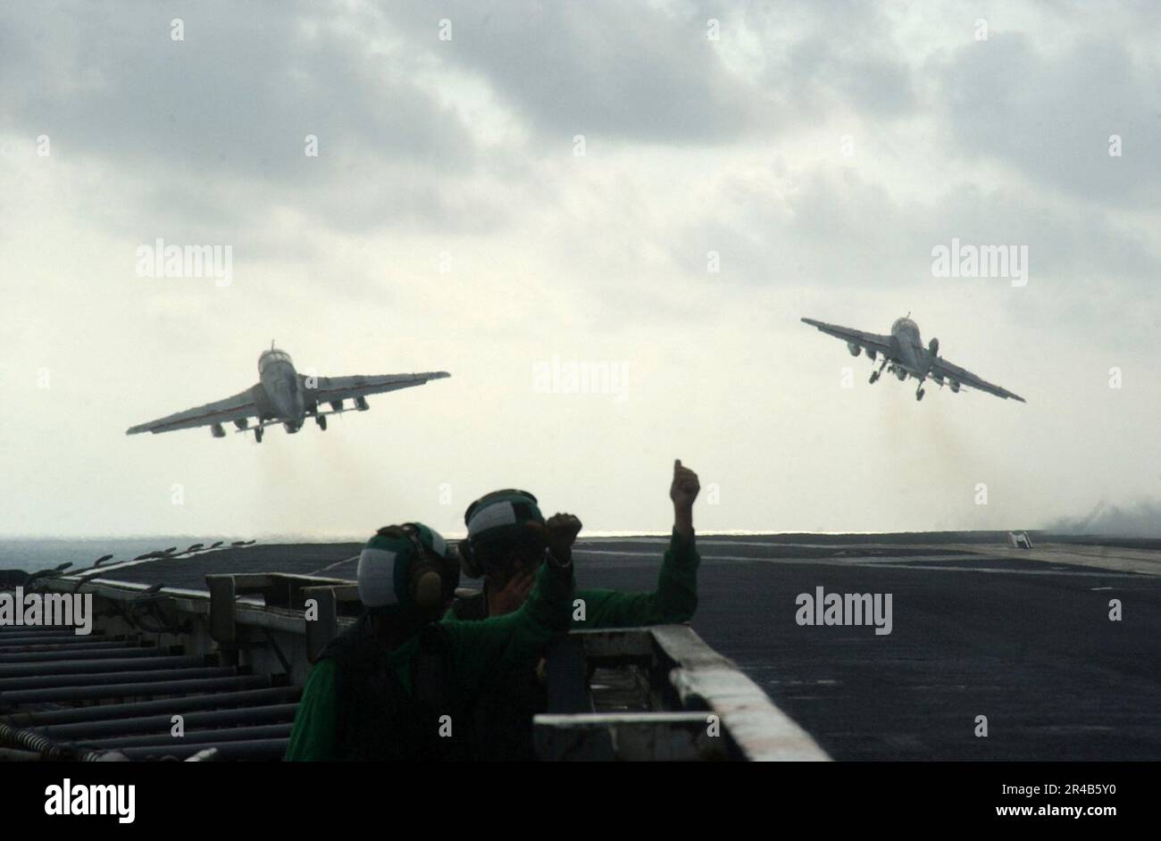 US Navy Launch coordinators give a thumbs up as two EA-6Bs from the ...