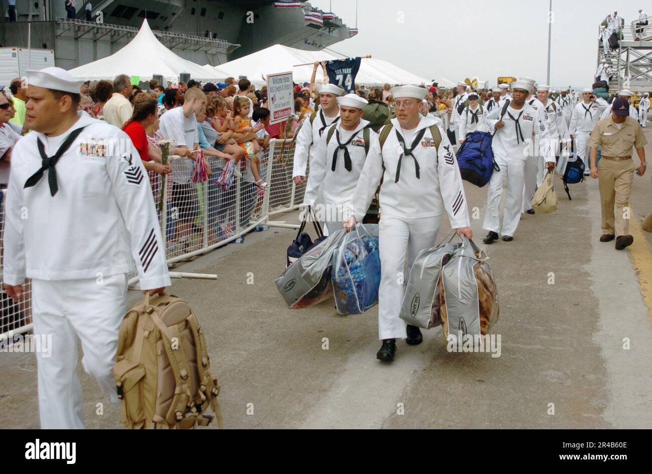 US Navy Sailors assigned to the Nimitz-class aircraft carrier USS Carl ...